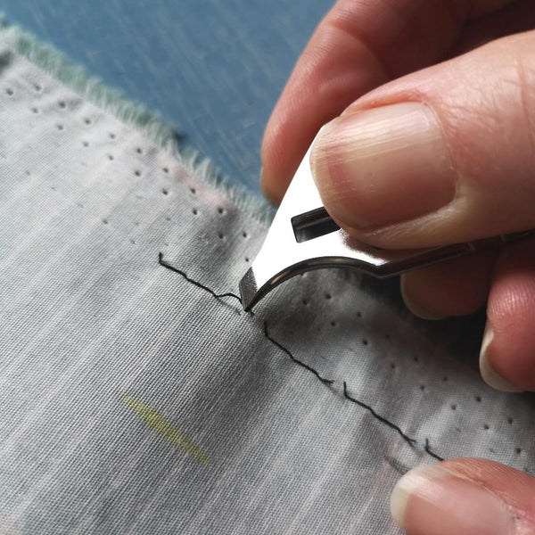 Thread Tweezers – Beyond Measure